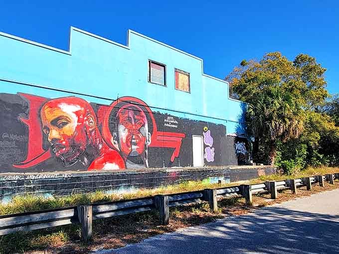 Vibrant murals turn ordinary buildings into outdoor galleries, because apparently some artists decided blank walls were just too boring to tolerate.