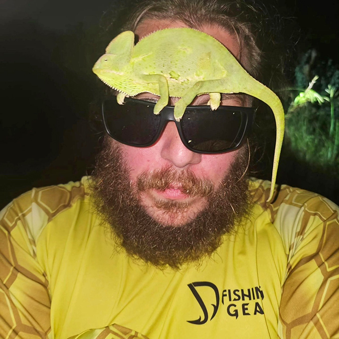 A moment of unexpected friendship as a veiled chameleon claims the best seat in the house &ndash; atop sunglasses and seemingly enjoying the view.