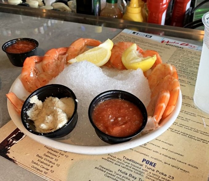 Shrimp cocktail elevated to an event, served on a bed of ice with dipping sauces that make these crustaceans the stars of their own show.