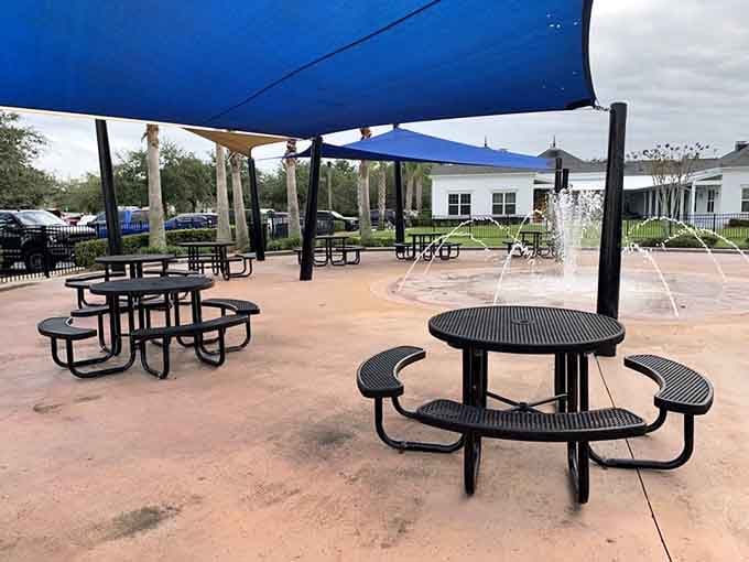 Shaded picnic tables offer front-row seats to the greatest show on earth: your kids actually playing outside instead of staring at screens.