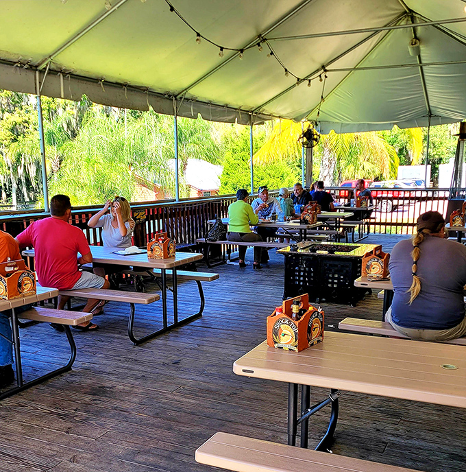 The covered outdoor dining area offers protection from the elements without sacrificing the spectacular views that make mealtime memorable.