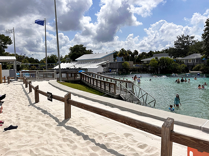 Beach meets spring at this unique waterfront, where white sand shores transition to crystal waters that maintain perfect 72-degree temperatures year-round.