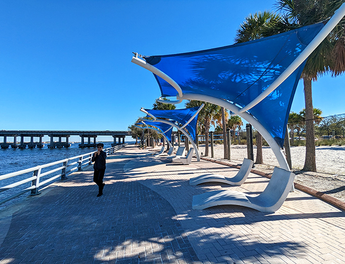 Blue shade sails and modern loungers &ndash; because Florida knows you need both style and sun protection to truly relax.