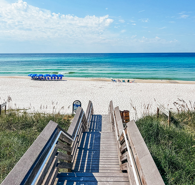 Wooden stairs leading to paradise &ndash; each step down brings you closer to the therapeutic sound of waves and worries washing away.