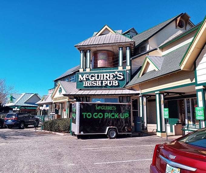 McGuire's Irish Pub brings a touch of the Emerald Isle to Pensacola with its distinctive green and white facade and welcoming entrance.