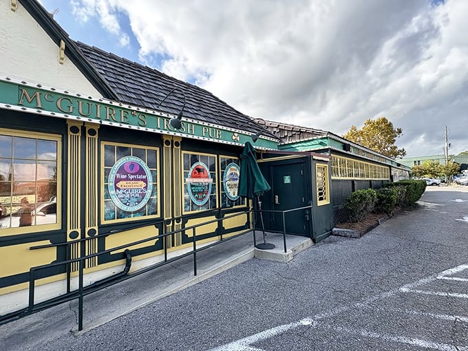 The traditional Irish pub styling of McGuire's exterior hints at the dollar-bill-covered interior where steaks and house-brewed beer await.