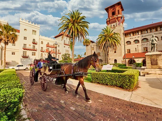 Horse-drawn carriages transport visitors through St. Augustine's historic district, where Spanish colonial architecture tells America's oldest city stories.
