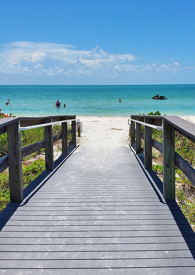 Boardwalk leading to the beach: The wooden runway to paradise, where each step brings you closer to that "ahh" moment of toes in sand.