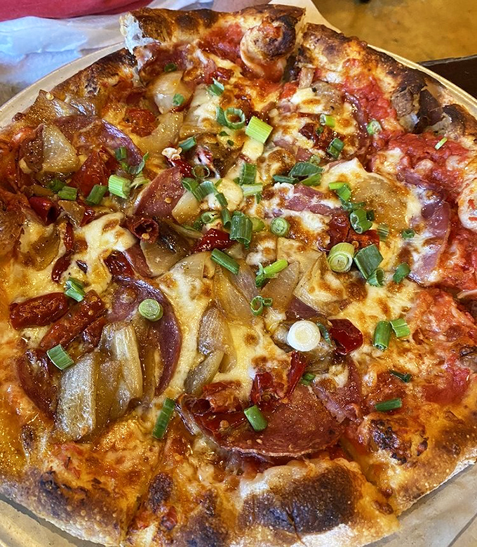 Heat seekers, rejoice! This spicy symphony with calabrese salami and peppers is cooled by sweet caramelized onions.