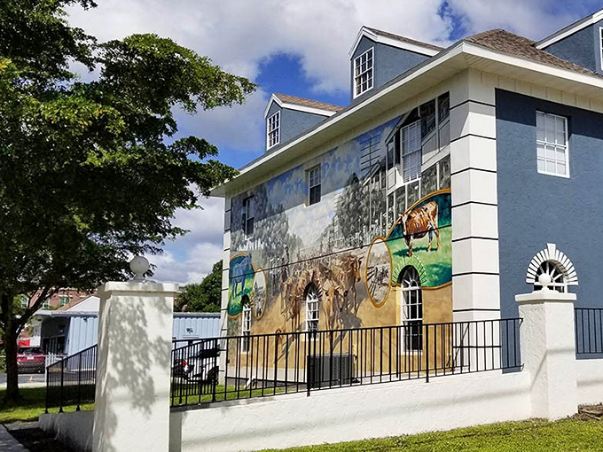 Cowboys drive their herd down Marion Avenue in this trompe l'oeil masterpiece&mdash;Florida's cattle history without the dust or smell.