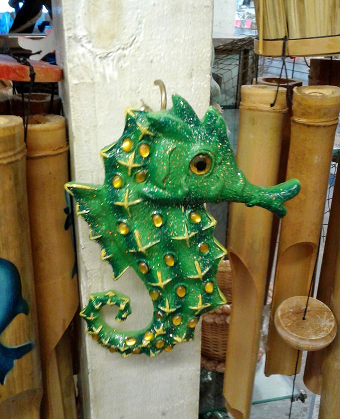 A glittering green seahorse decoration captures the playful side of maritime decor – part kitsch, part coastal charm.