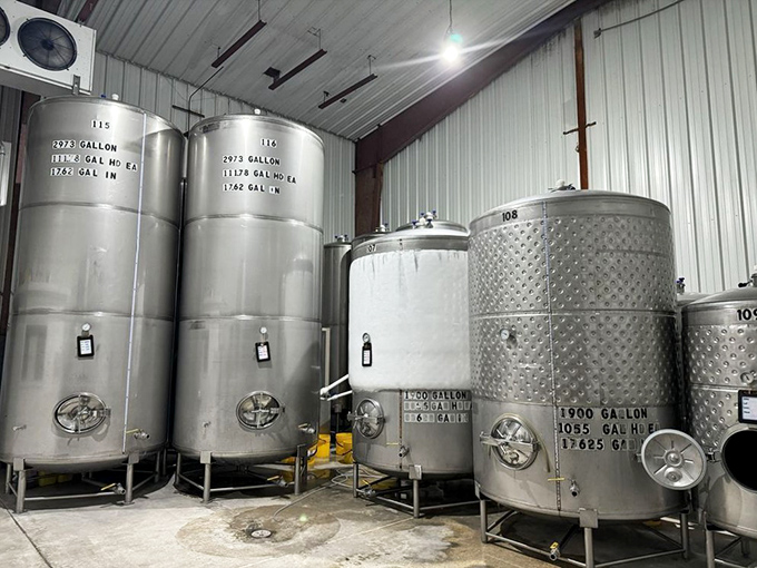 Behind the magic: Massive steel tanks where tropical fruits are transformed into award-winning wines.