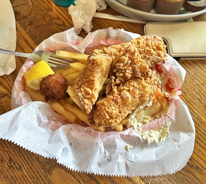 The grouper sandwich: a golden-fried testament to the belief that sometimes simple really is best.