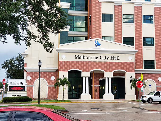 Melbourne City Hall blends brick-and-mortar authority with coastal flair, anchoring the community with its distinctive nautical emblem.