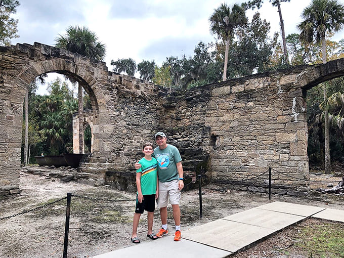 Modern visitors stand where 19th-century workers once labored, connecting generations through shared space and enduring curiosity about the past.