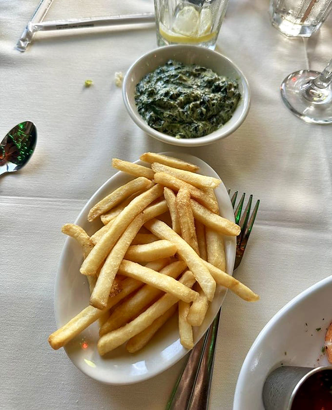 Creamed spinach and fries prove that sometimes the supporting actors steal the scene from the headliners.