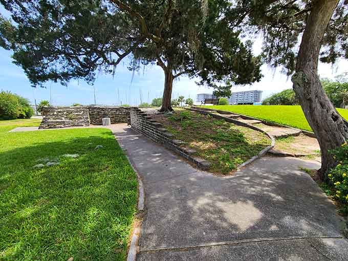 Winding pathways invite leisurely exploration through grounds where history and nature have reached a peaceful understanding about sharing space.