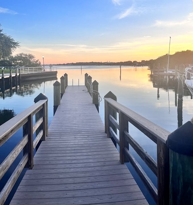 Sunset paints the marina in golden hour glory, proving that the best shows in Florida don't require tickets or reservations.