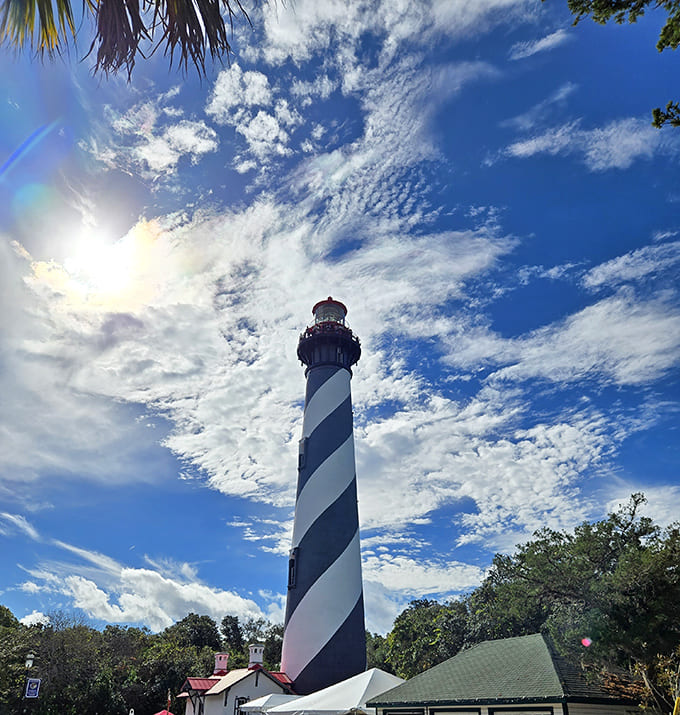 Against that impossibly blue Florida sky, the lighthouse stands like a giant exclamation point declaring "History happened here, and it was awesome!"