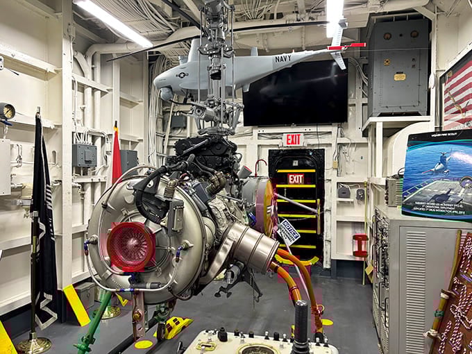 Another interior space reveals the complexity of shipboard systems, with pipes and equipment filling every available inch.