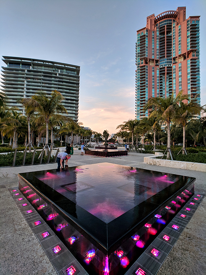Modern art meets playground fun in this illuminated water feature that makes adults secretly wish they were kids again.