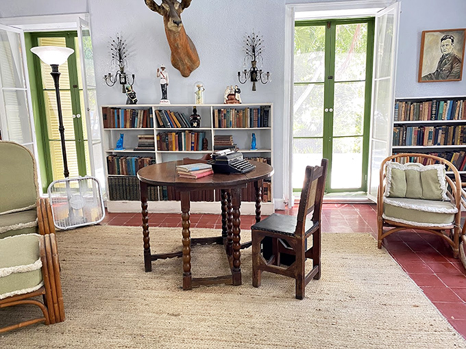 Where genius flowed: Hemingway's writing room remains frozen in time, typewriter waiting for words that changed literature forever.