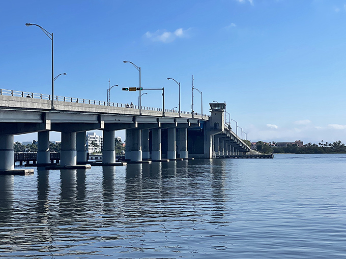 The Lake Worth Bridge connects the mainland to Palm Beach, offering structural beauty against the natural landscape.