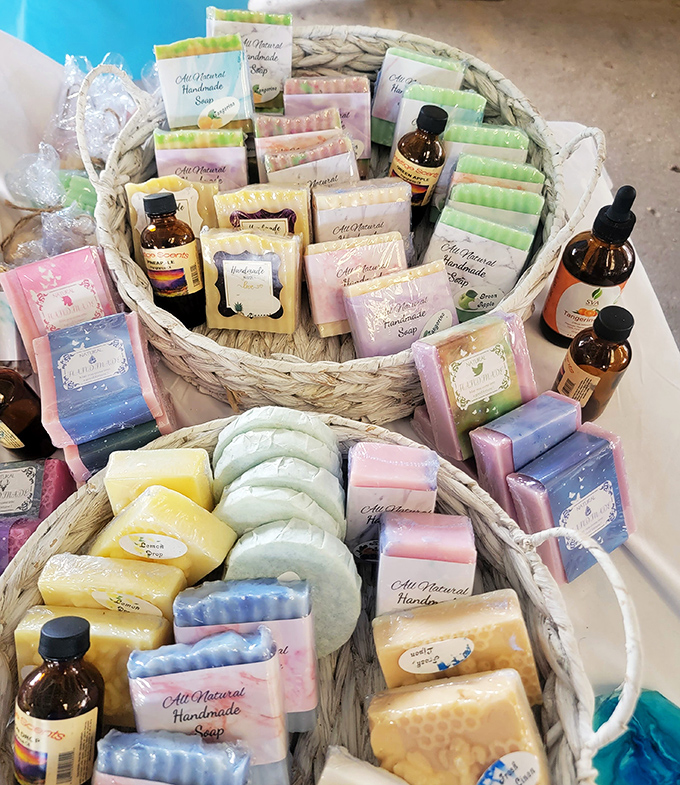 Handcrafted soaps in every imaginable hue and scent sit nestled in wicker baskets, their artisanal creators having transformed simple ingredients into small works of aromatic art.