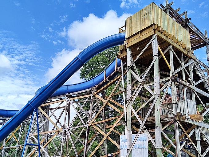 Engineering meets nature as this towering water slide structure delivers screaming riders directly into the embrace of ancient spring waters.
