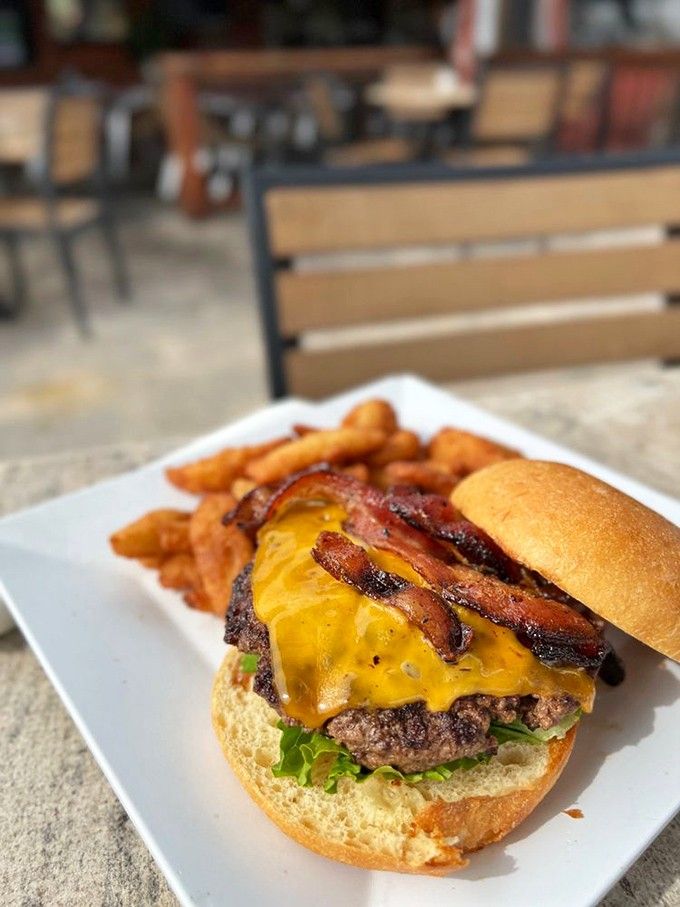 Bacon and melted cheese draped over a perfectly cooked burger is the kind of simple perfection that never goes out of style.