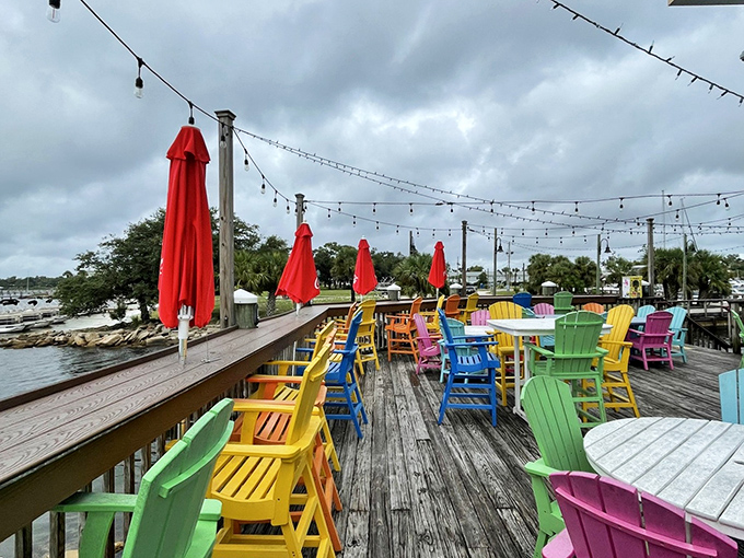 Barefoot's multi-story turquoise building commands attention on the waterfront. This coastal landmark promises seafood with a view from every level.