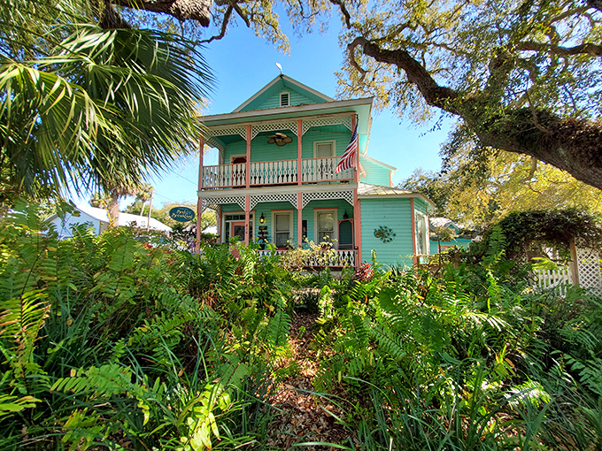 What a charming, colorful house surrounded by lush greenery! Cedar Key looks like the perfect tropical getaway.