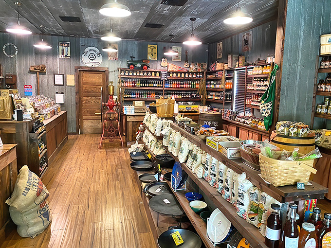 The weathered wooden exterior of Richloam General Store stands as a time capsule from the 1920s, complete with vintage gas pumps and country charm.