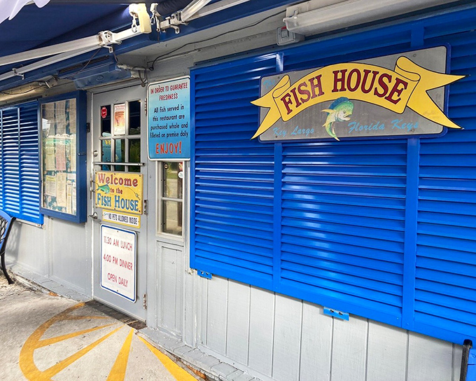 The Fish House's bright blue shutters and simple white exterior hide one of the Keys' most beloved seafood treasures.