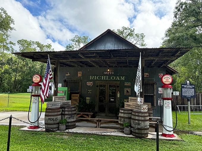 Step into Florida's past at this historic general store where antique barrels, American flags, and rustic signage create an authentic old-time atmosphere.