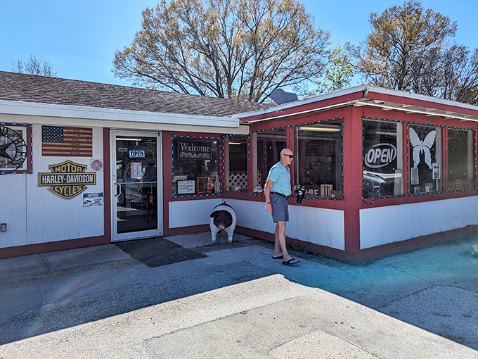 Red Top's classic diner exterior promises hearty portions and friendly service. The Harley-Davidson sign hints at its popularity with hungry road-trippers.