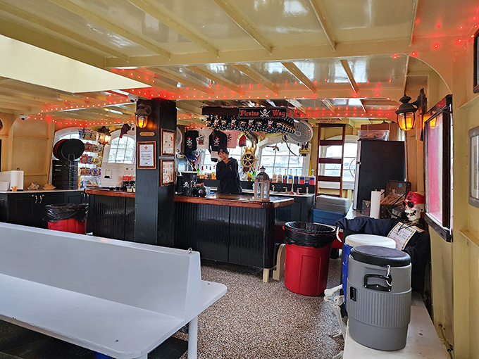 The ship's bar serves up liquid courage for landlubbers, with nautical decorations that would make Blackbeard raise his mug in approval.