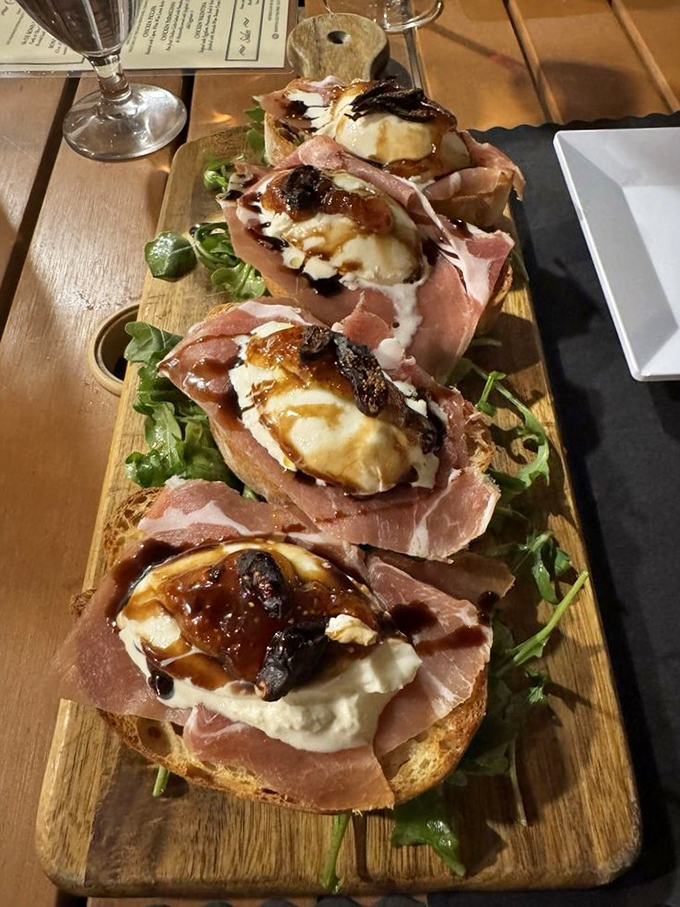 Burrata appetizer that's essentially cheese performing a magic trick &ndash; firm outside, creamy revelation inside. Worth every calorie.