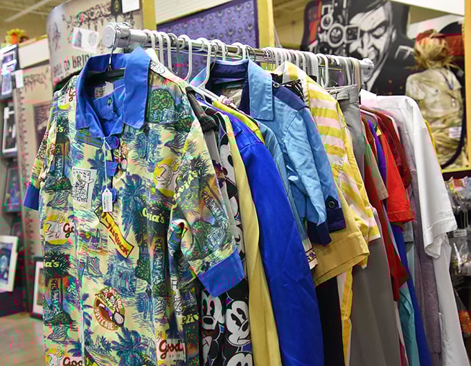Hawaiian shirts and vintage threads hang like colorful time capsules from another era, when clothing was built to last and patterns weren't afraid to speak up.