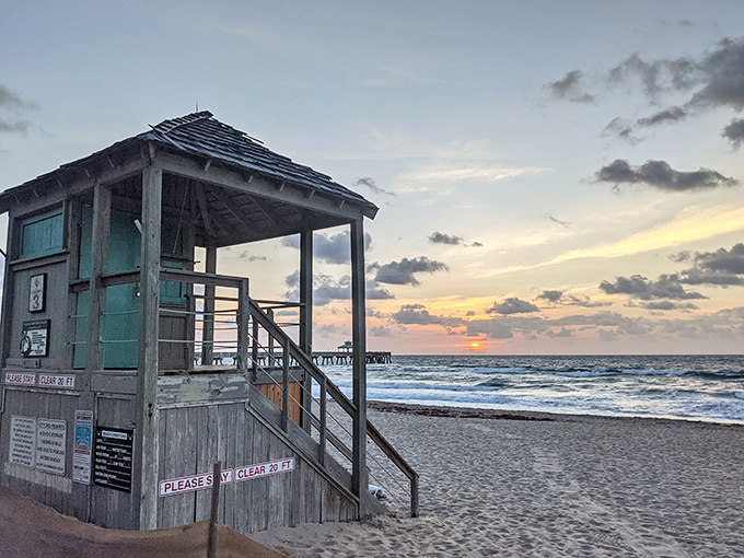 Lifeguard stations stand sentinel over Deerfield's shores, where sunset transforms the ordinary into the extraordinary every single evening.