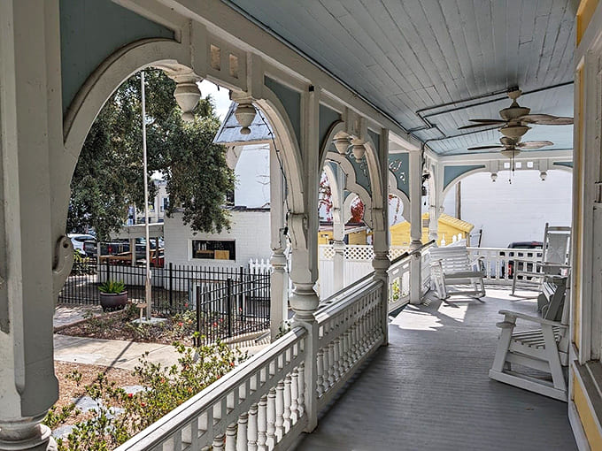 Victorian porches were designed for leisurely sitting and polite conversation, activities that continue here regardless of which century the participants are from.