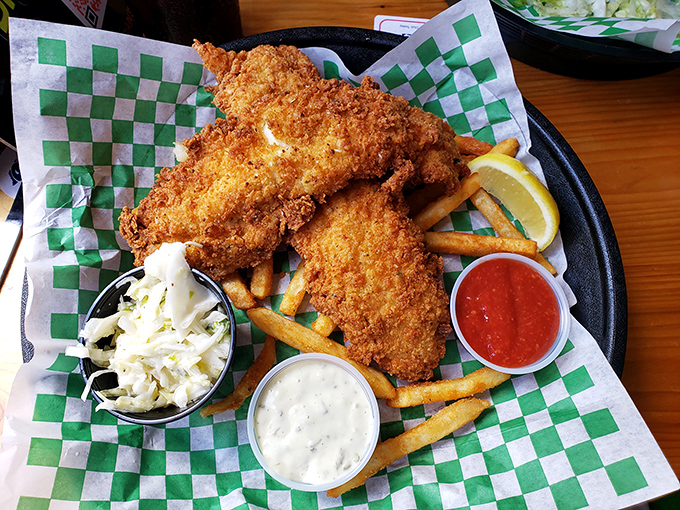 Fish and chips that achieve the golden-brown perfection that British pubs have been chasing for centuries, with coleslaw for color commentary.