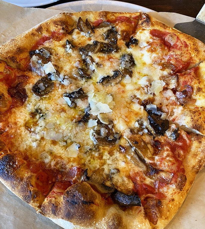 Truffle oil elevates this woodland wonder to gourmet status &ndash; mushrooms and bacon never had such a luxurious backdrop.