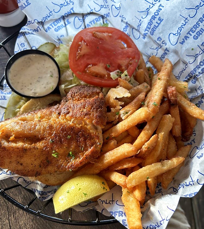 The quintessential Florida sandwich experience &ndash; a generous portion of flaky fish elevated by fresh toppings and crispy fries.