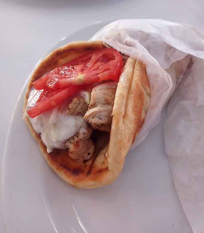 Chicken souvlaki wrapped in warm pita with all the fixings proves that simple ingredients can create something absolutely crave-worthy.