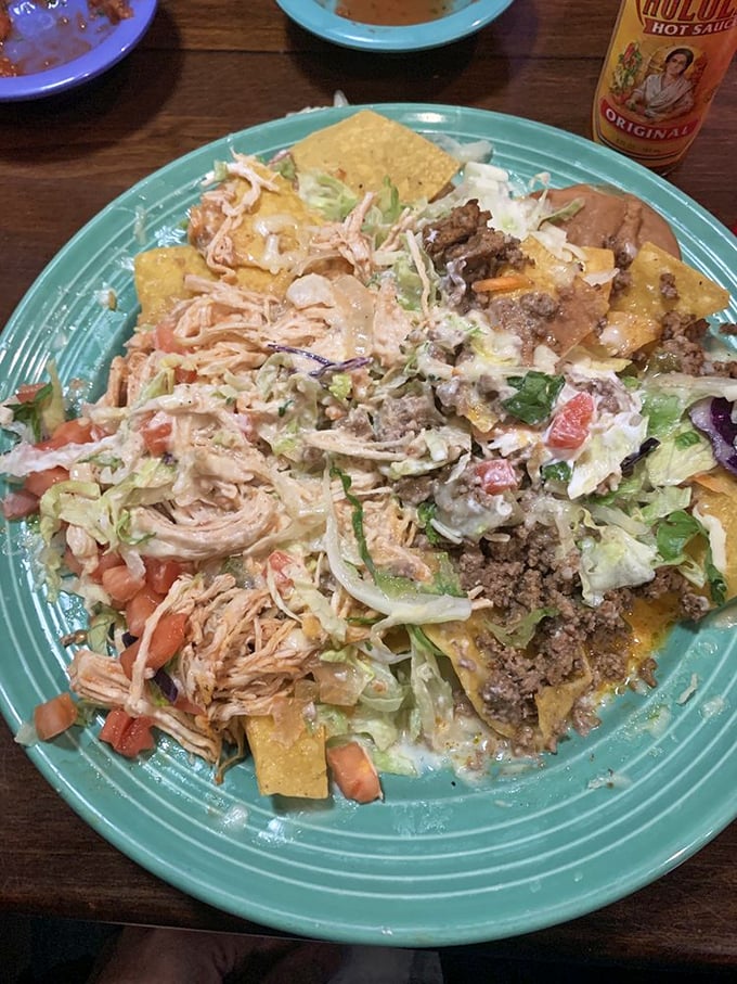 Nachos Grande isn't just a name, it's a promise, and this mountain of chips loaded with everything delivers on that promise spectacularly.