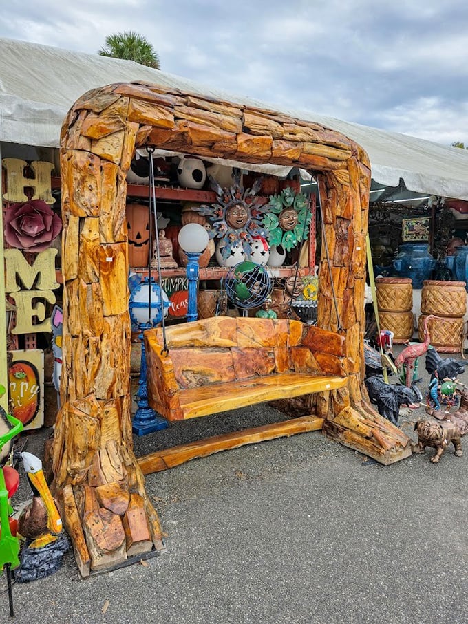 Nature's perfect recliner &ndash; this tree trunk swing invites weary art explorers to pause and contemplate life from inside a wooden hug.