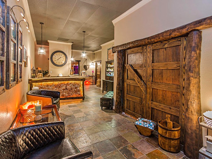 Welcome to tranquility: The reception area's rustic wooden doors and warm lighting set the tone for relaxation.