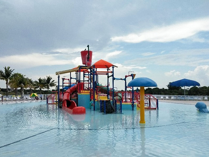 The Splash Adventure water playground &ndash; where giant tipping buckets create memories (and occasional panic) for delighted youngsters seeking relief from Florida heat.