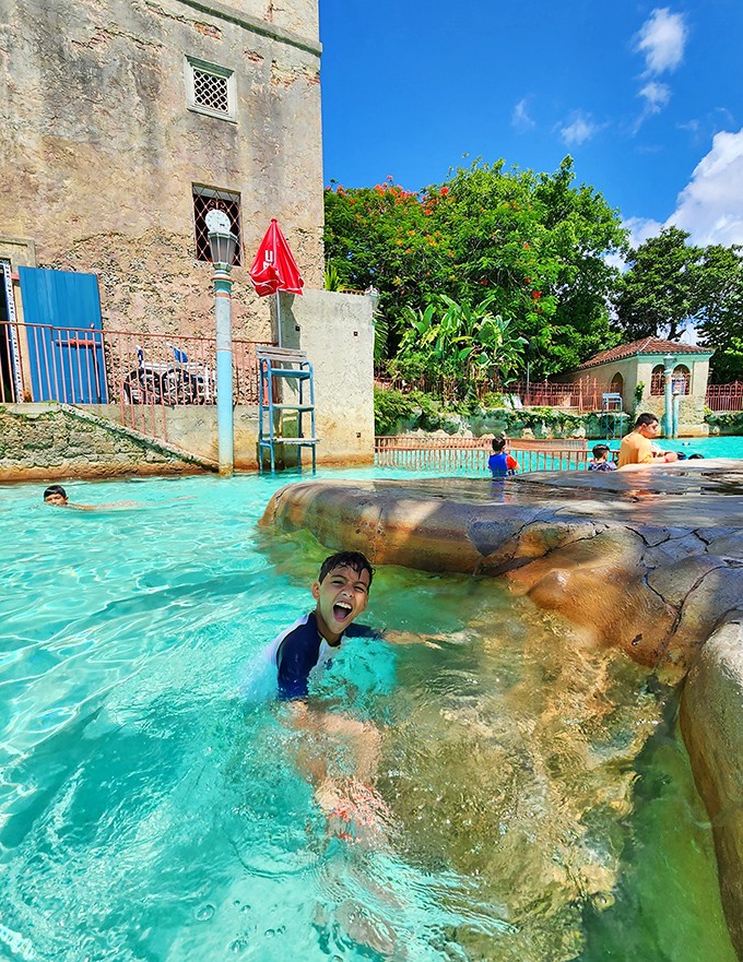 Pure joy captured: That magical moment when a young swimmer discovers the freedom of cool spring water on a hot Florida day.